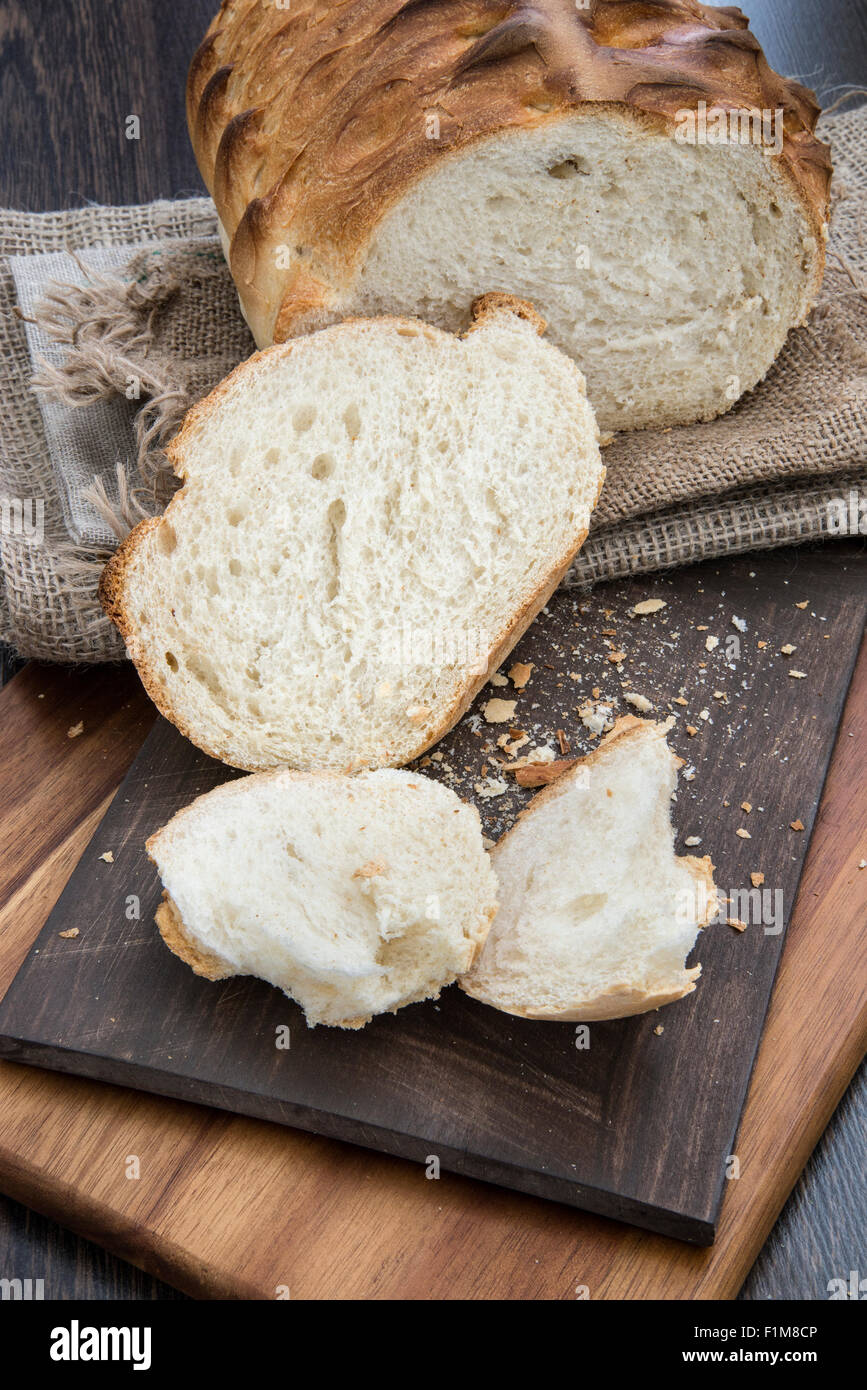 Fresh rustic loaf of bread in farmhouse setting Stock Photo - Alamy
