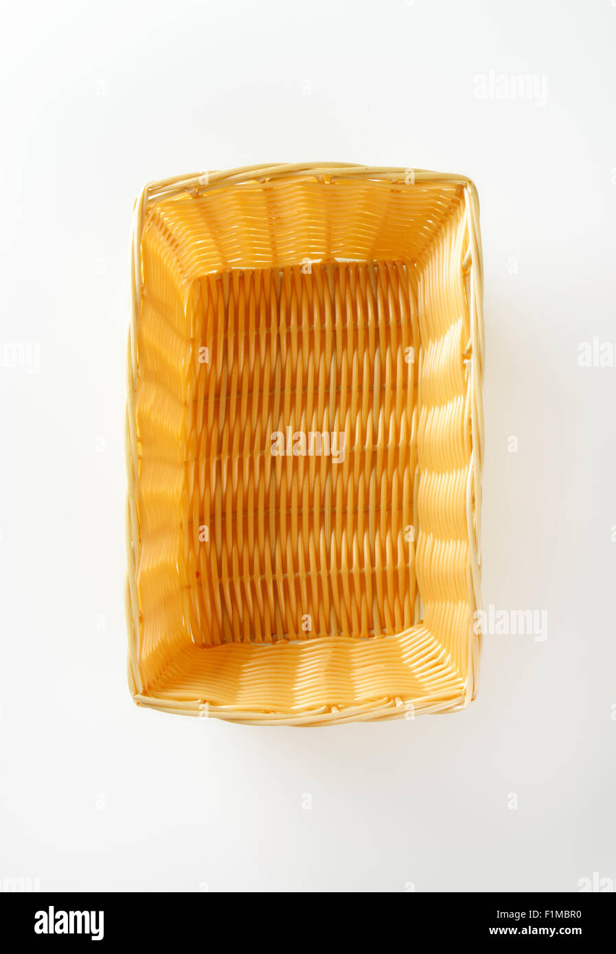 empty wicker bowl on white background Stock Photo - Alamy
