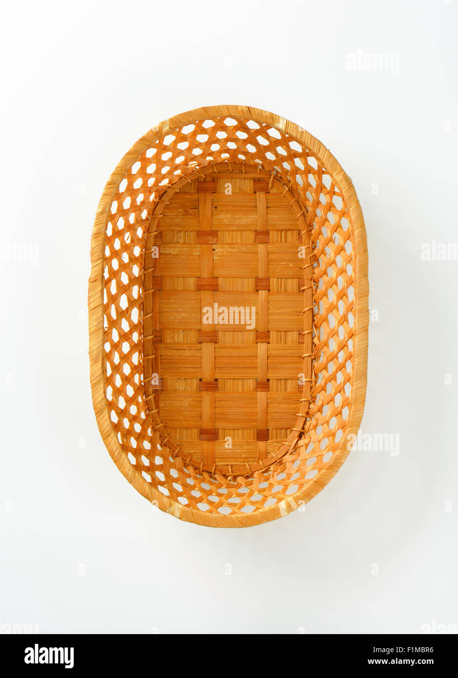 empty wicker bowl on white background Stock Photo - Alamy