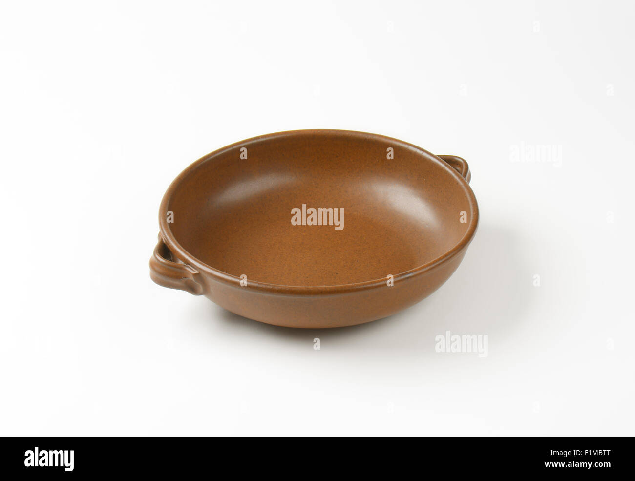 empty casserole dish on white background Stock Photo - Alamy