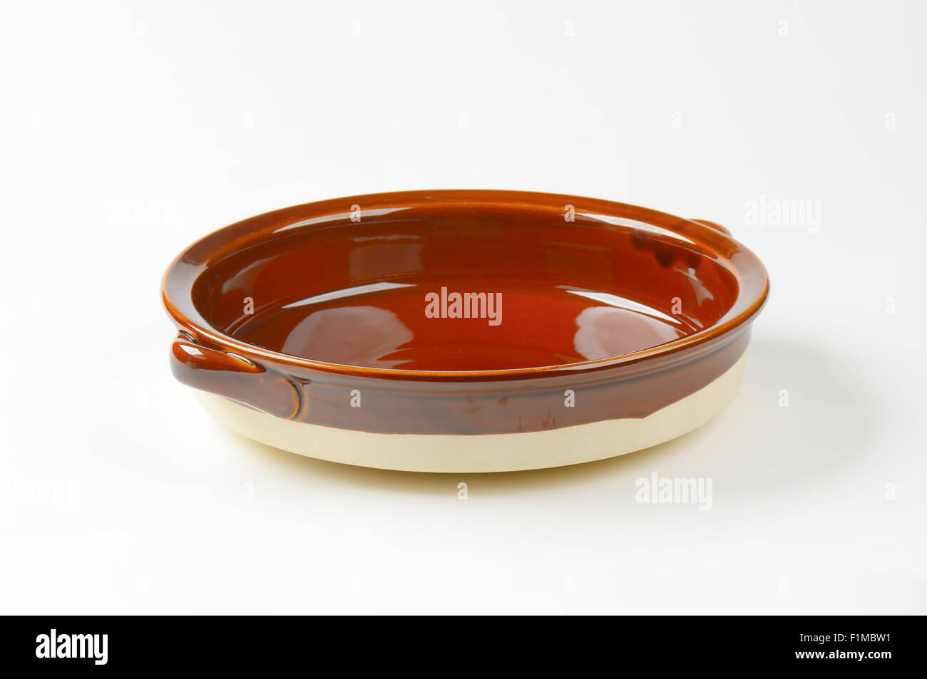 empty casserole dish on white background Stock Photo - Alamy
