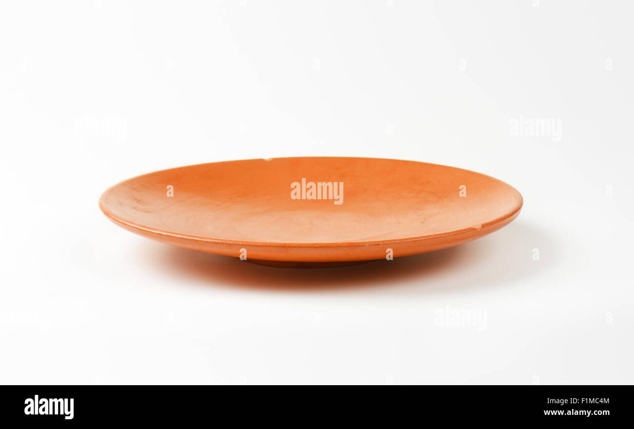 Empty orange ceramic plate hi-res stock photography and images - Alamy