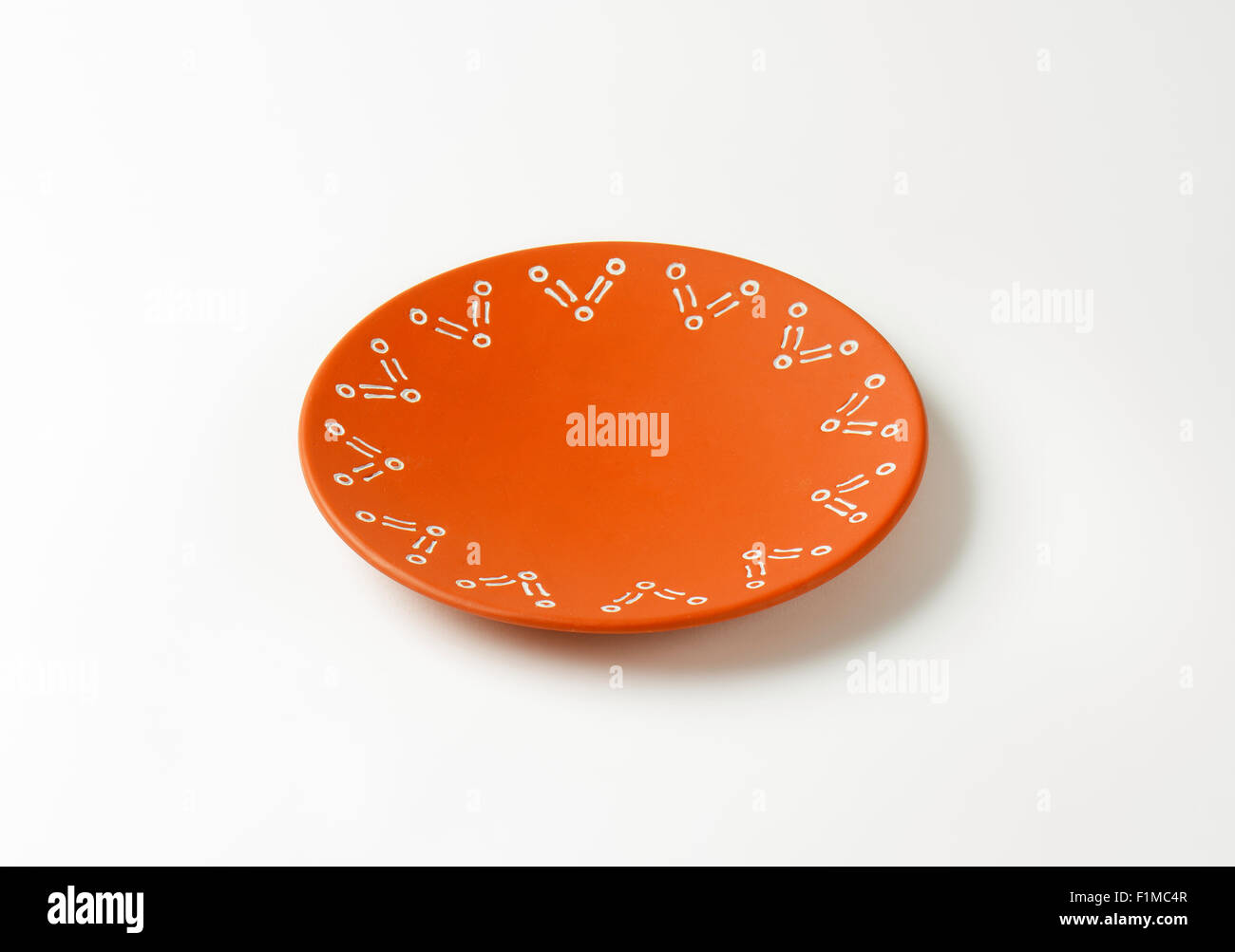 Empty orange ceramic plate hi-res stock photography and images - Alamy