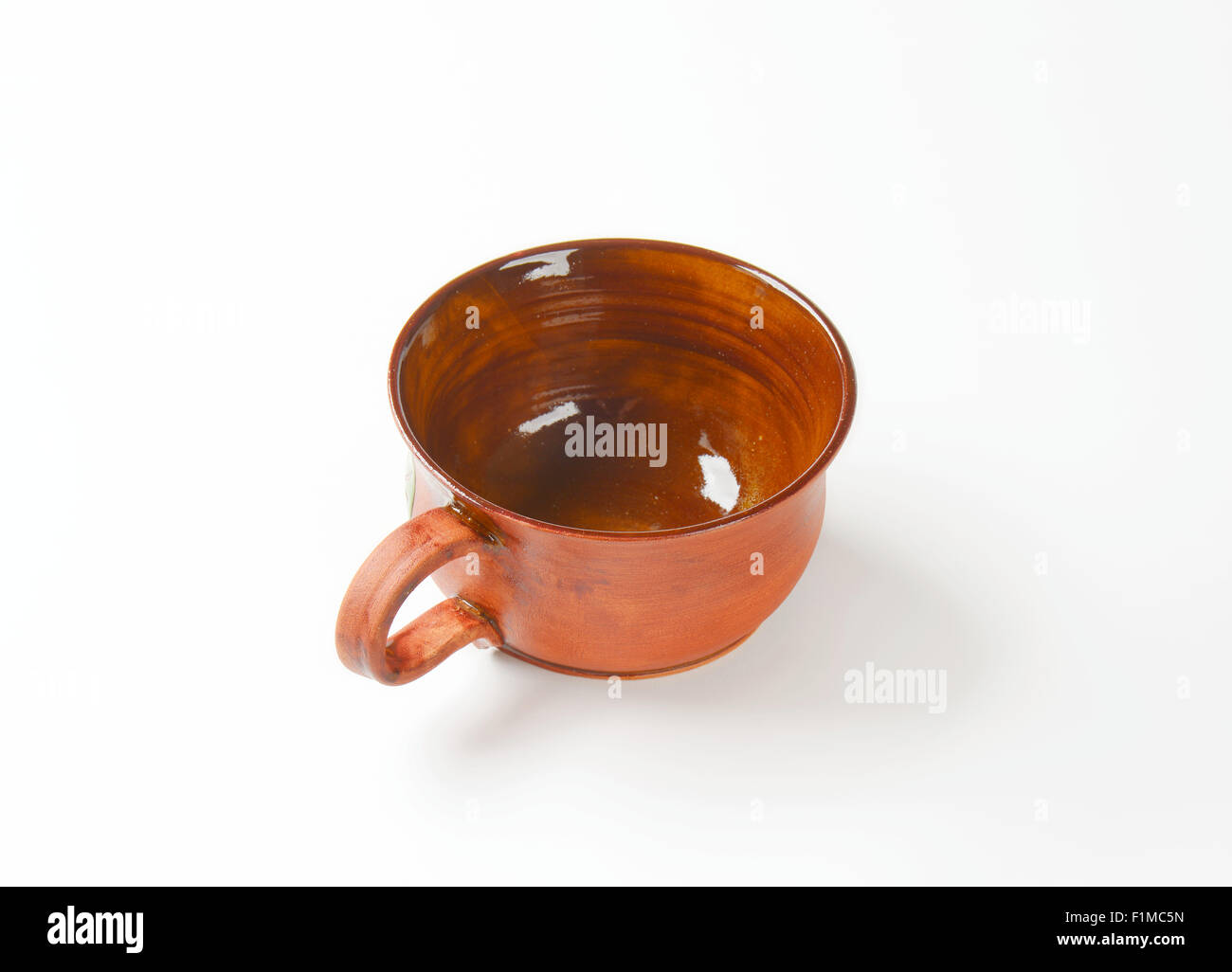 empty handcrafted mug on white background Stock Photo - Alamy