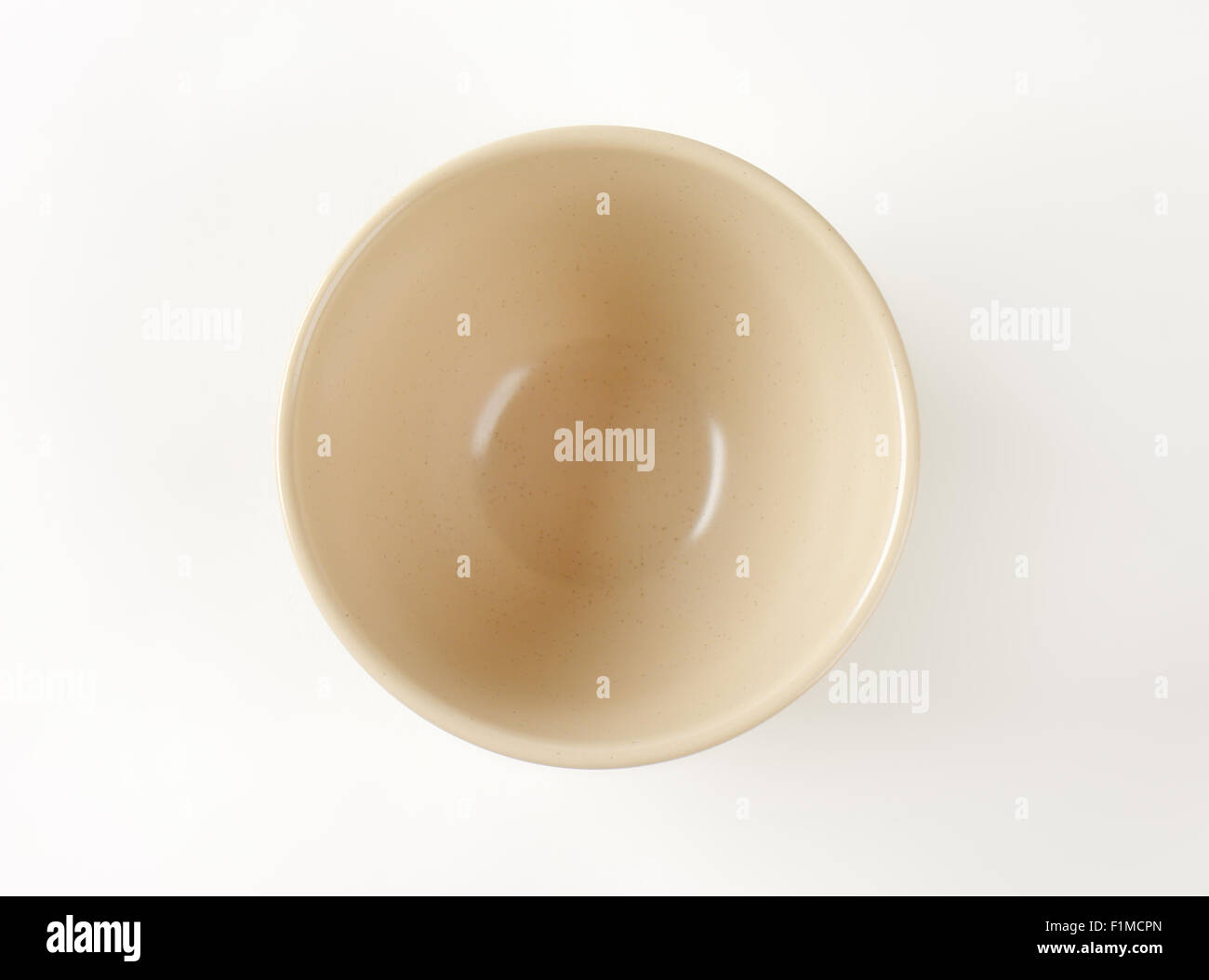 empty beige bowl on white background Stock Photo - Alamy