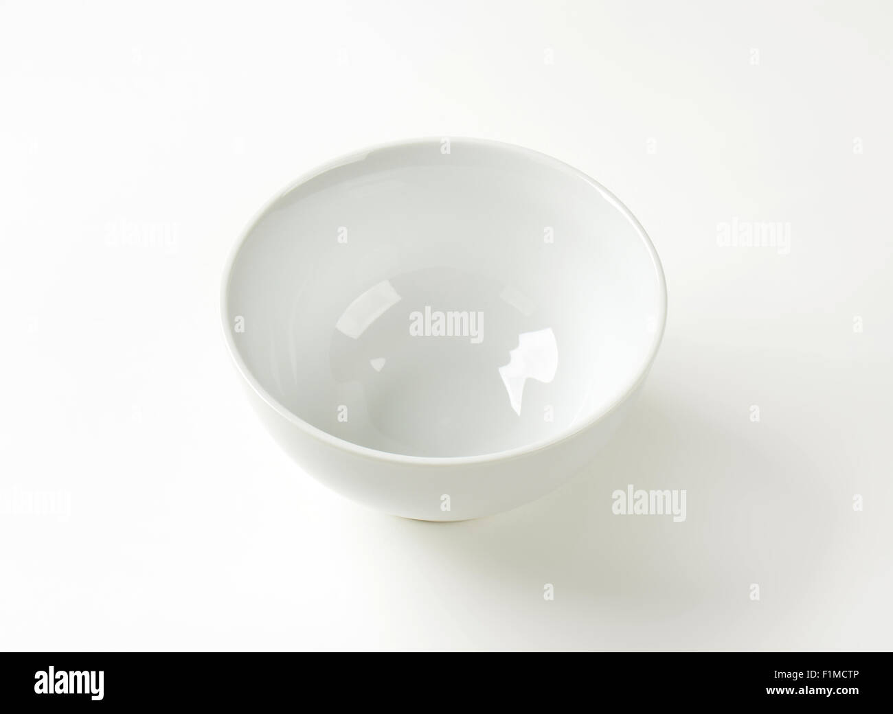 empty white bowl on white background Stock Photo - Alamy