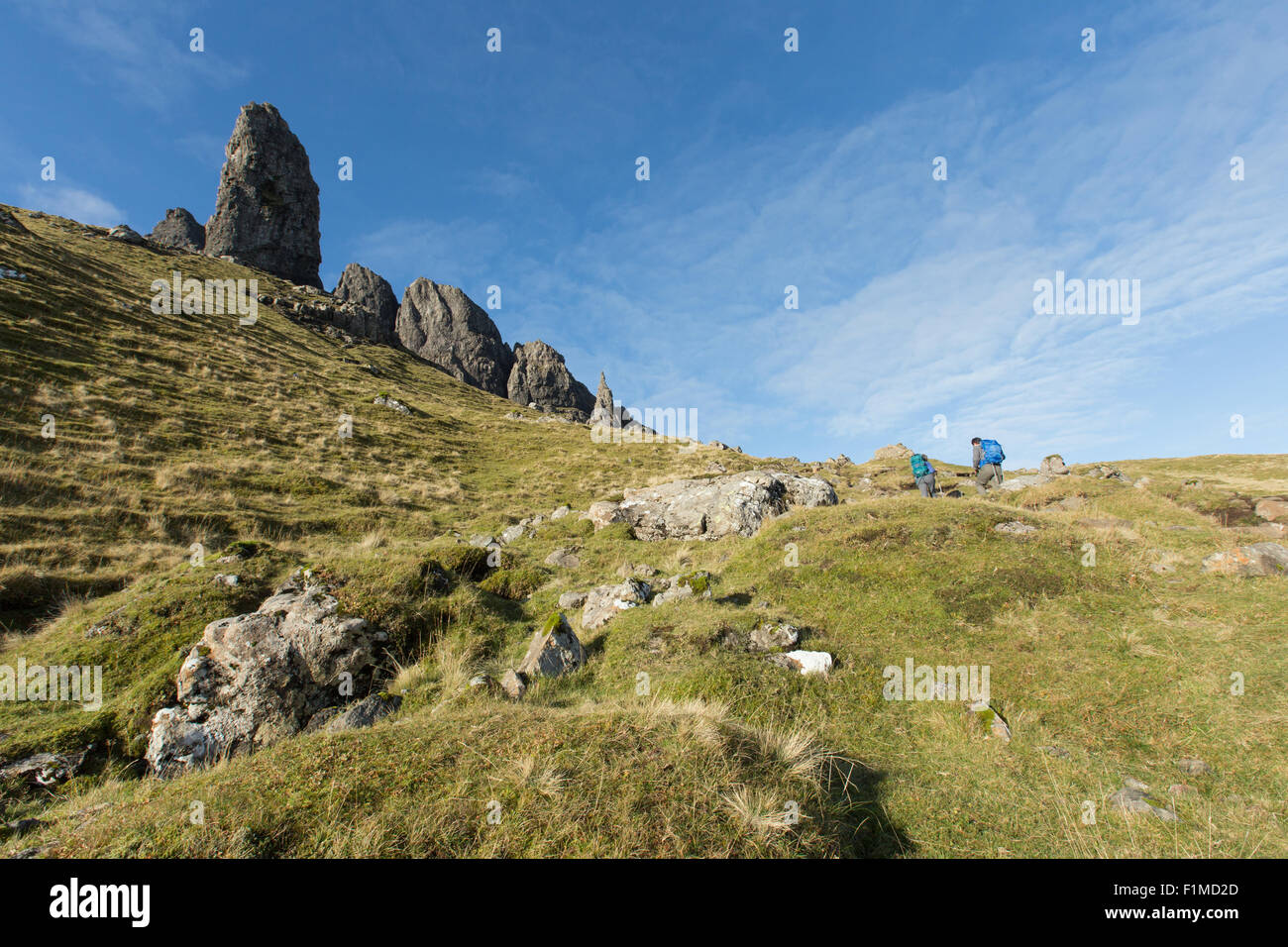 Man hiking through Scottish highlands in the Isle of Skye, Scotland ...