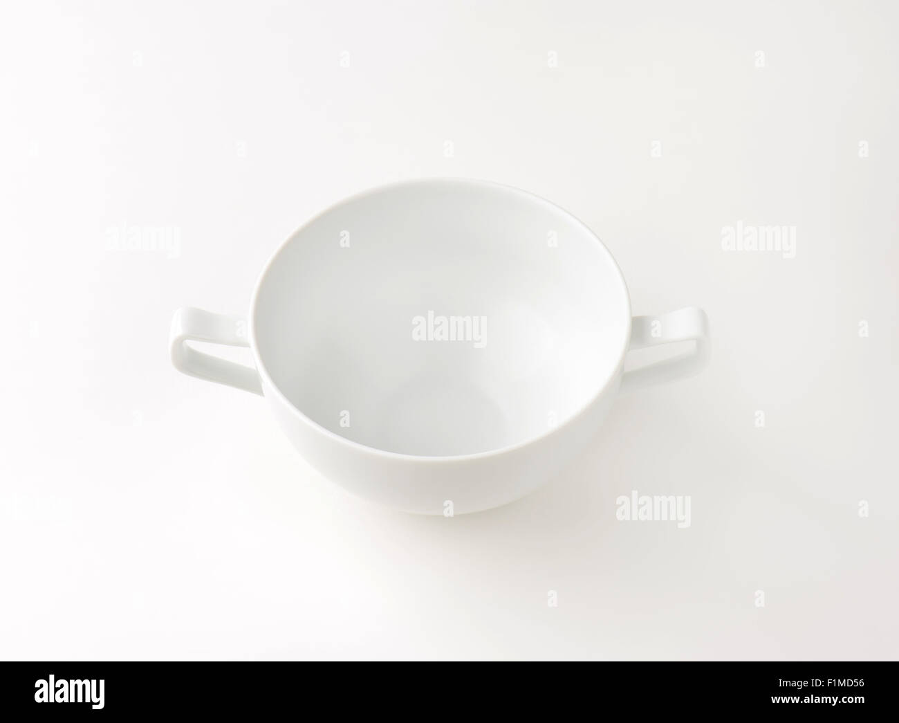 empty tea cup on white background Stock Photo - Alamy
