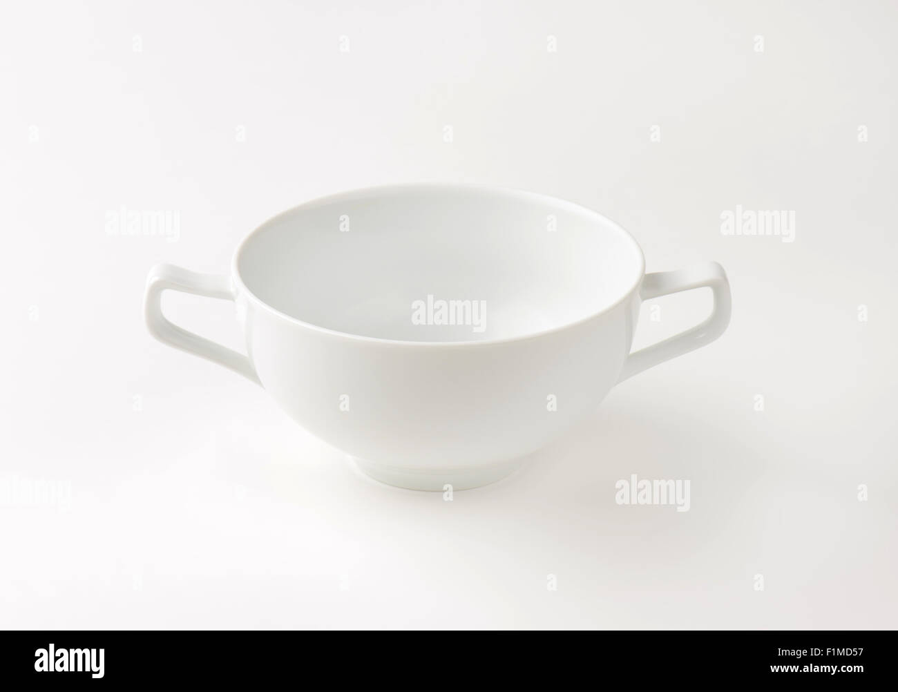 empty tea cup on white background Stock Photo - Alamy