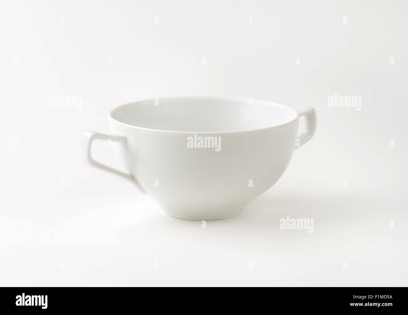 empty tea cup on white background Stock Photo - Alamy