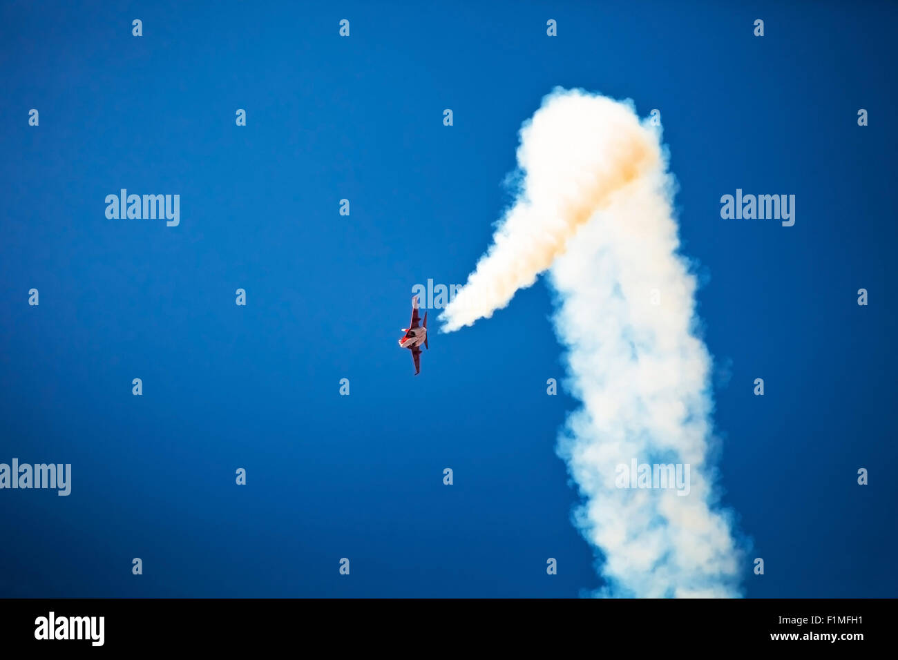 Background of jet fighter show in blue sky Stock Photo - Alamy
