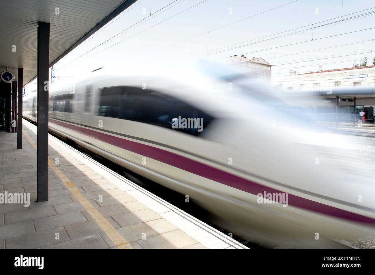 High speed train in movement on a railway station horizontal Stock ...
