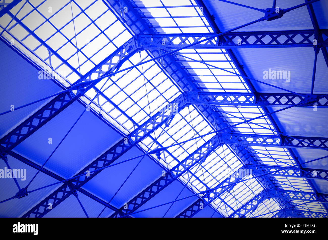 Industrial ceiling of a railway station toned in the blue color Stock ...