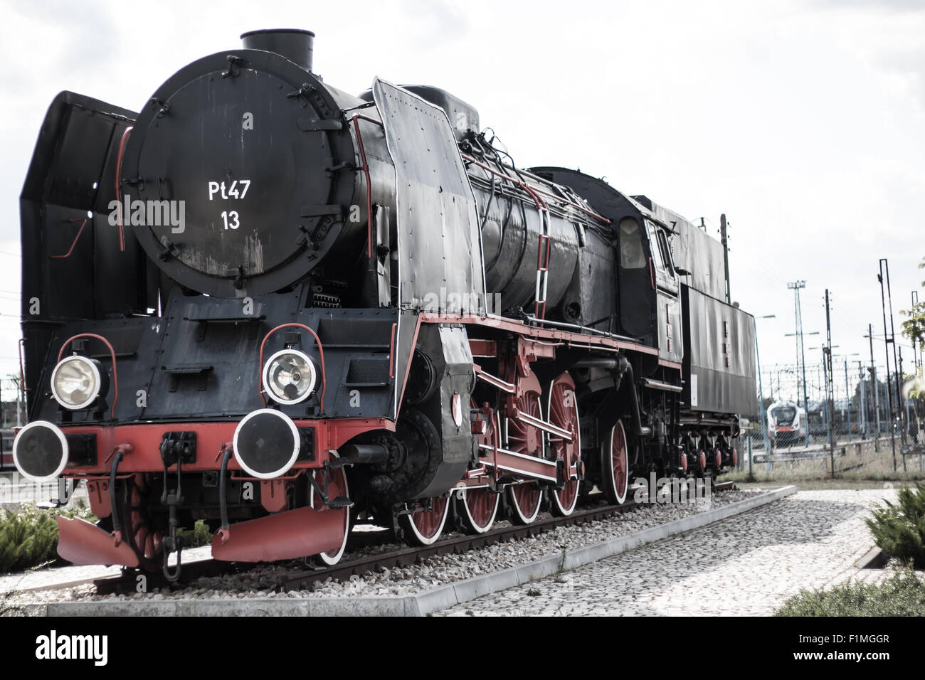 a steam train in a train station Stock Photo - Alamy