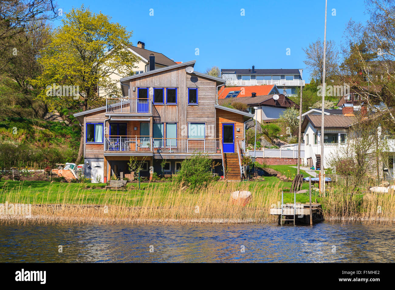 Modern wooden swedish waterfront residential family house home in ...