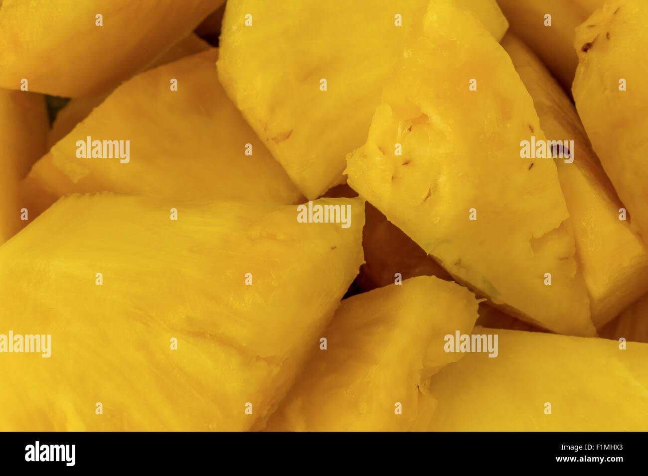 Fresh and ripe pineapple close-up shot background Stock Photo - Alamy