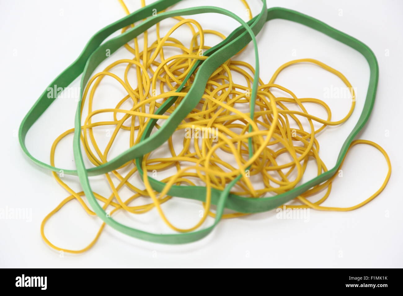Several rubber bands isolated on white background Stock Photo - Alamy