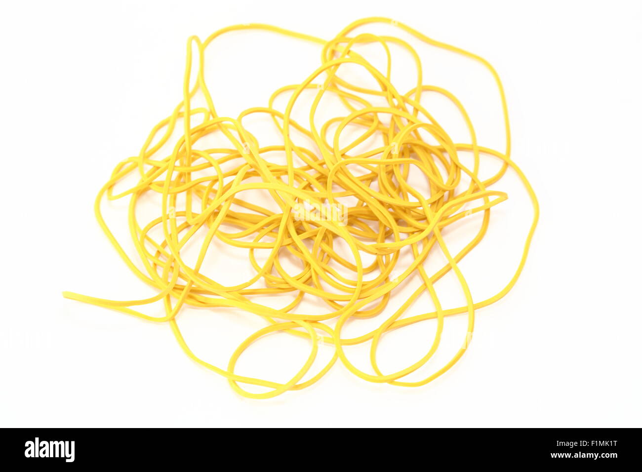 Several rubber bands isolated on white background Stock Photo - Alamy
