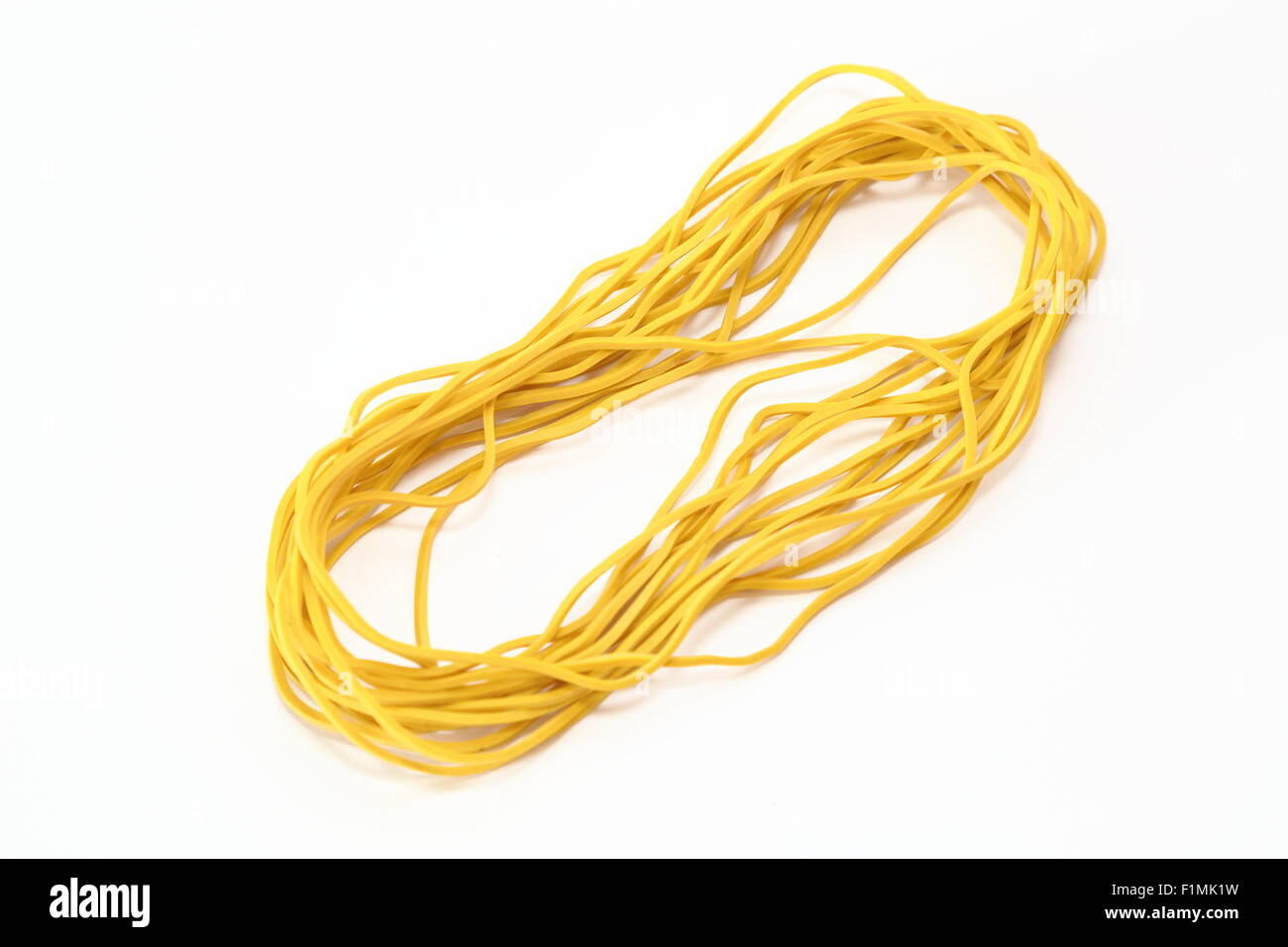 Several rubber bands isolated on white background Stock Photo - Alamy