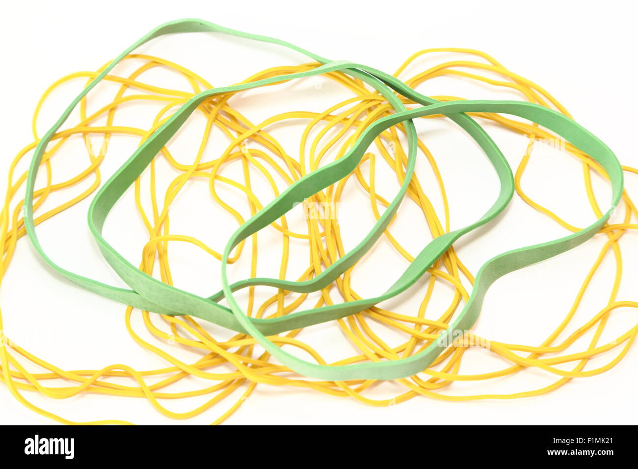Several rubber bands isolated on white background Stock Photo - Alamy