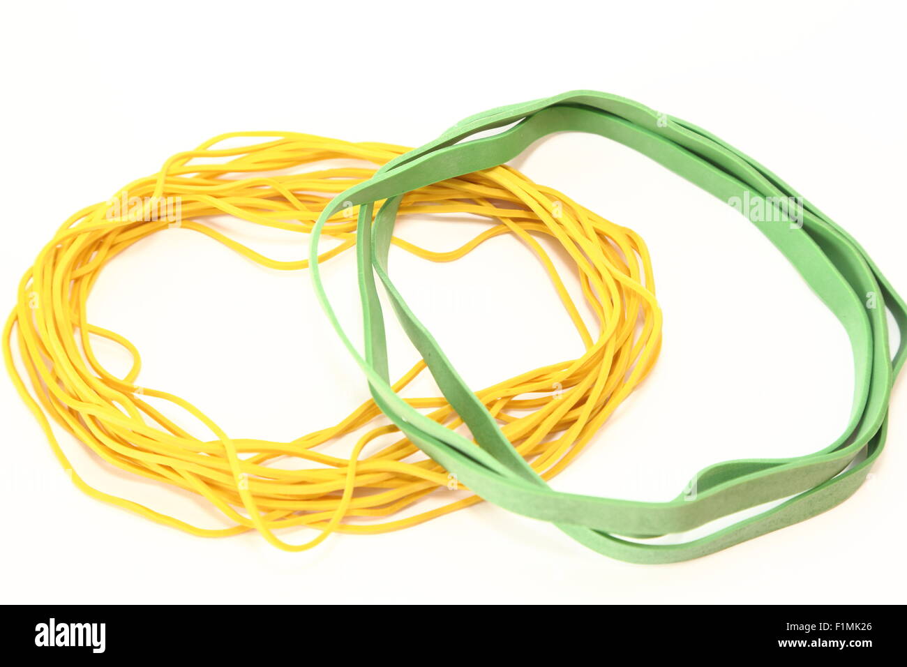 Several rubber bands isolated on white background Stock Photo - Alamy