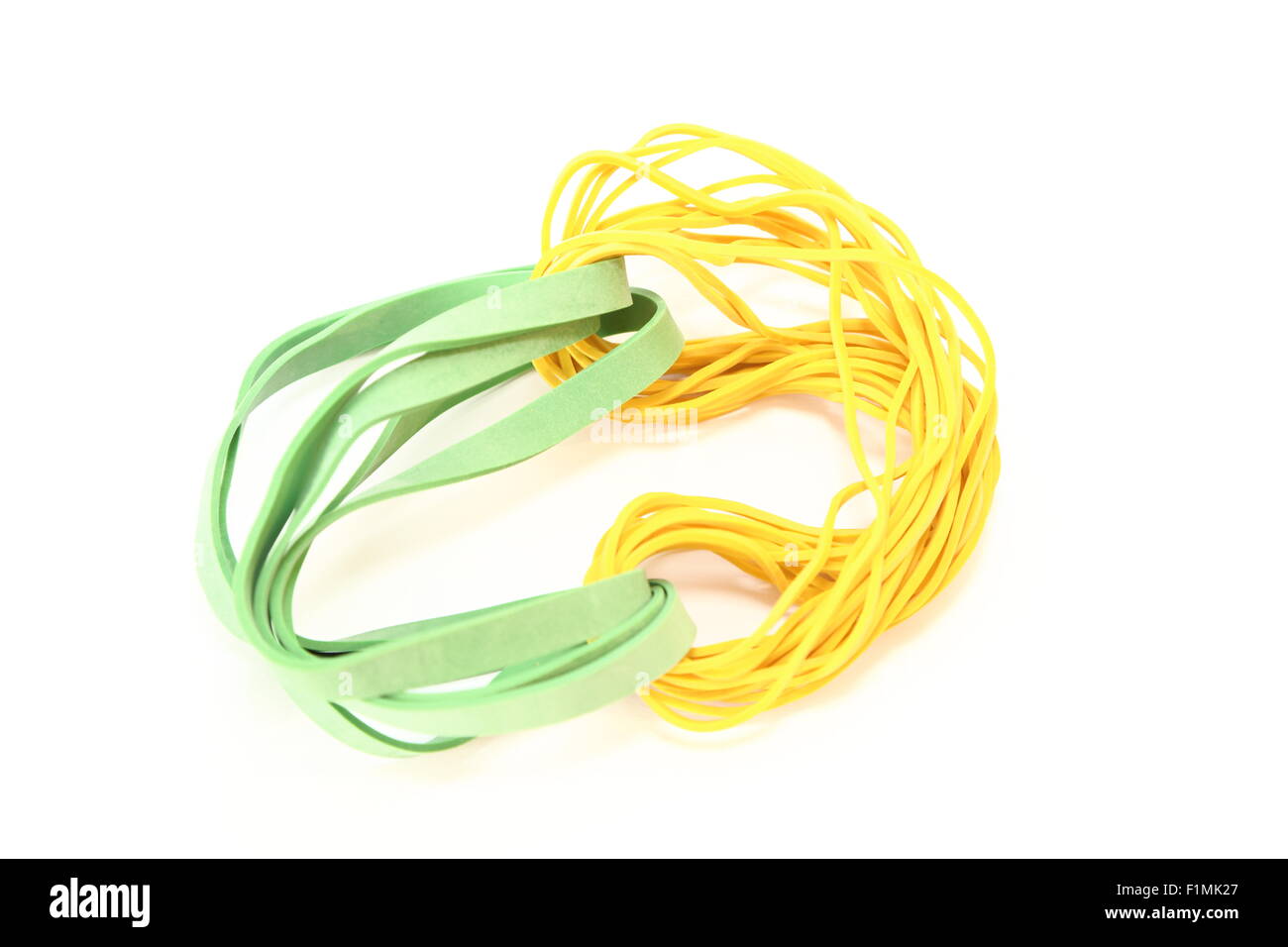 Several rubber bands isolated on white background Stock Photo - Alamy