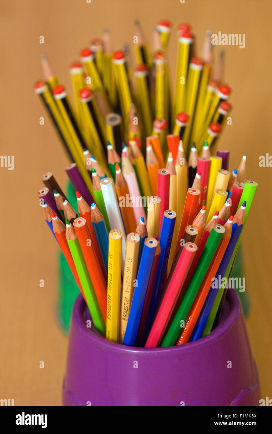 Stack of coloured pencils in primary school classroom, London, UK Stock ...