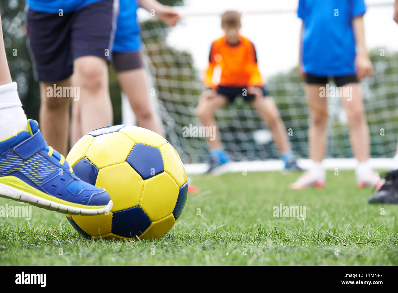 Feet on soccer ball hi-res stock photography and images - Alamy