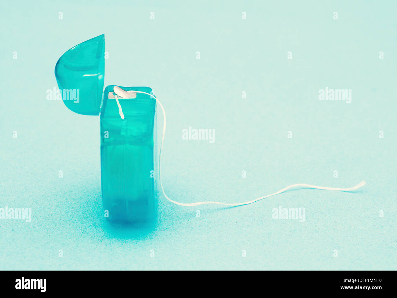 Teeth string hi-res stock photography and images - Alamy