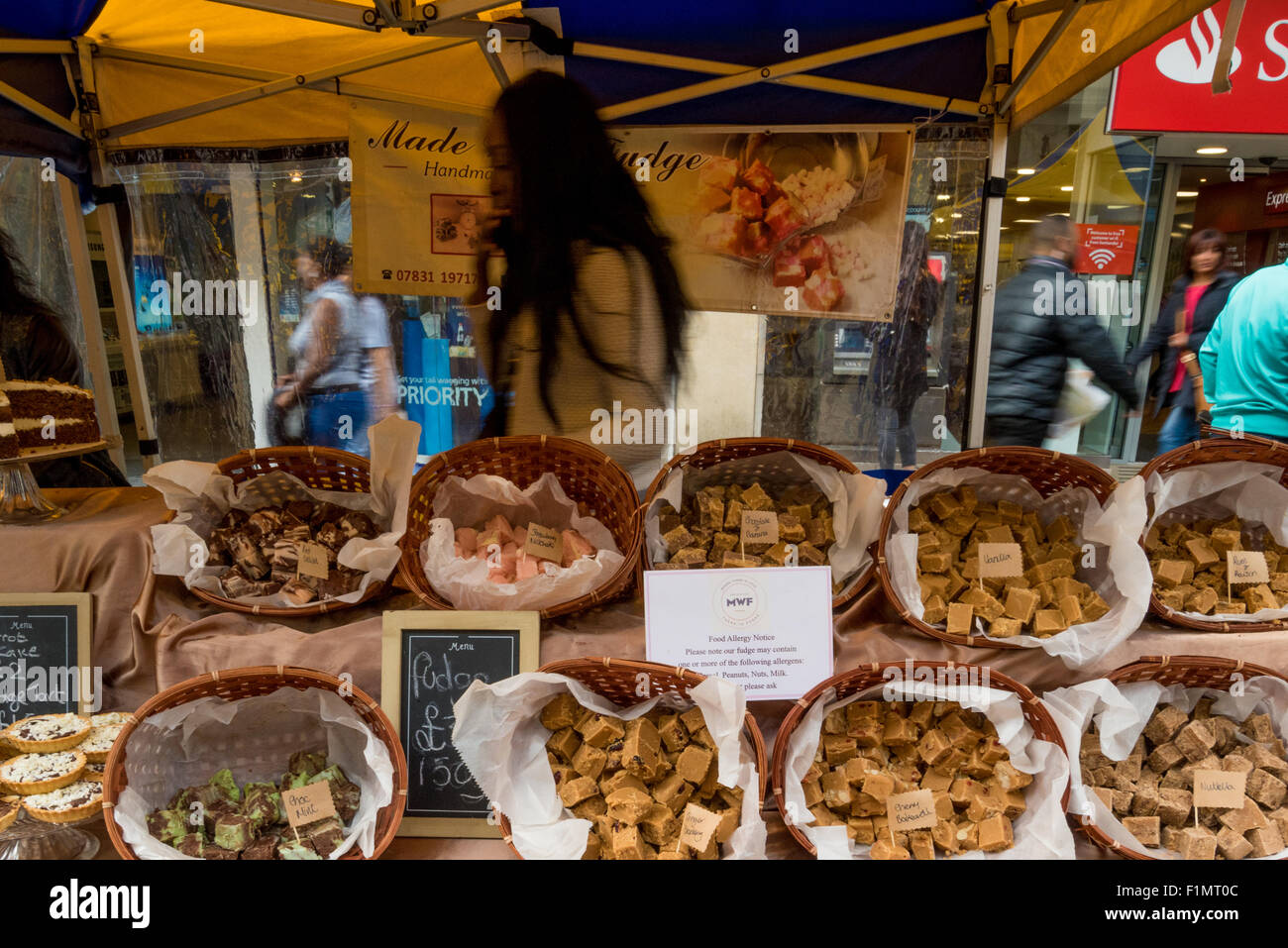 A female stall holder on a cake and fudge stall at Wolverhampton Street ...