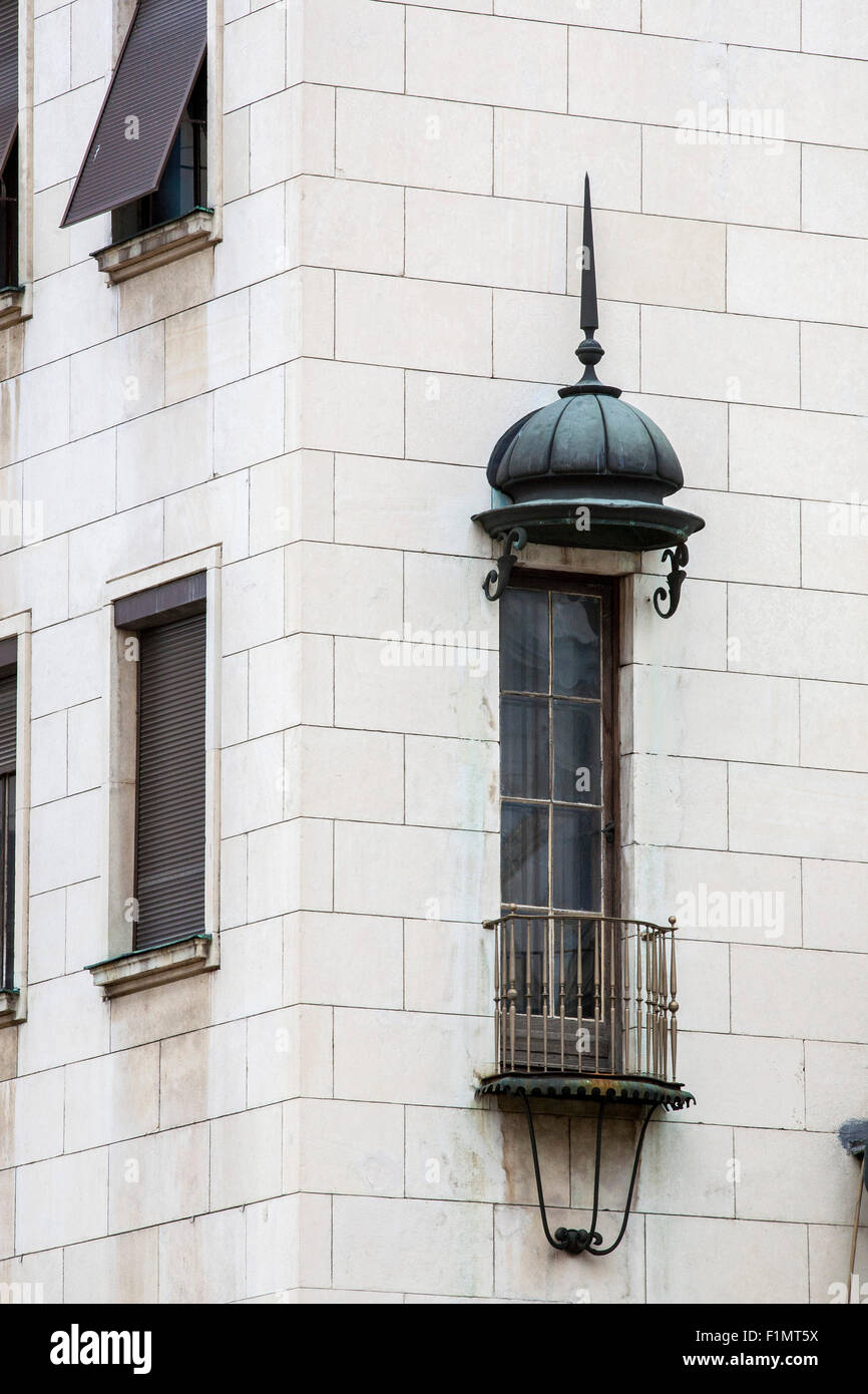 Architecture detail, a little decorative balcony on the facade of ...