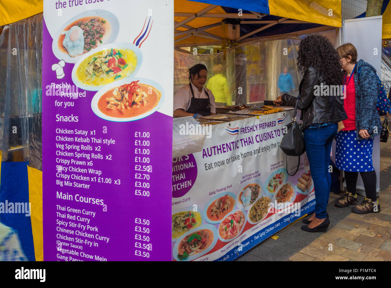 People waiting to be served at a Thai Kitchen stall at Wolverhampton ...
