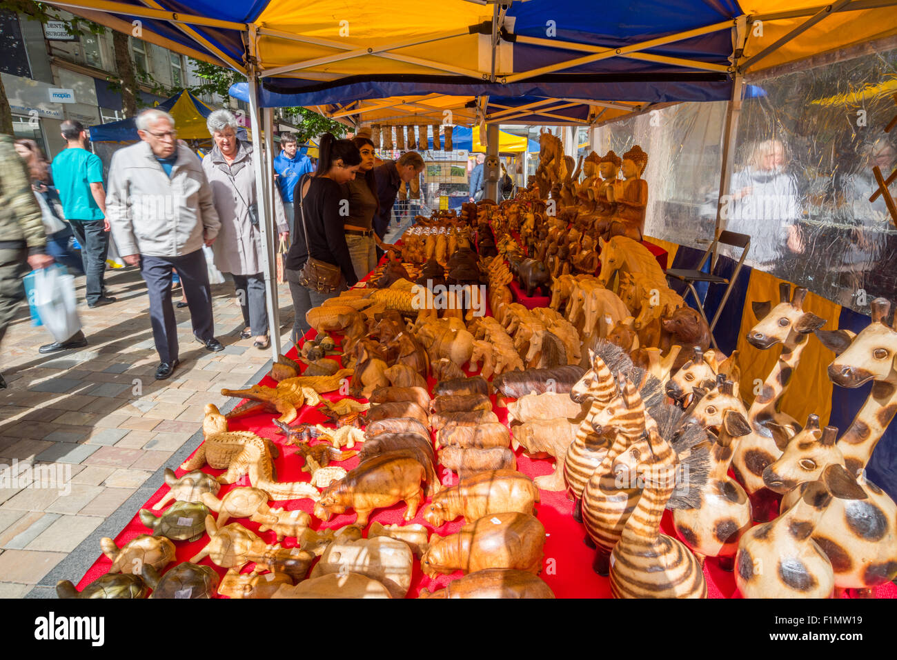 Wooden animal carvings on a stall at Wolverhampton Street market west ...