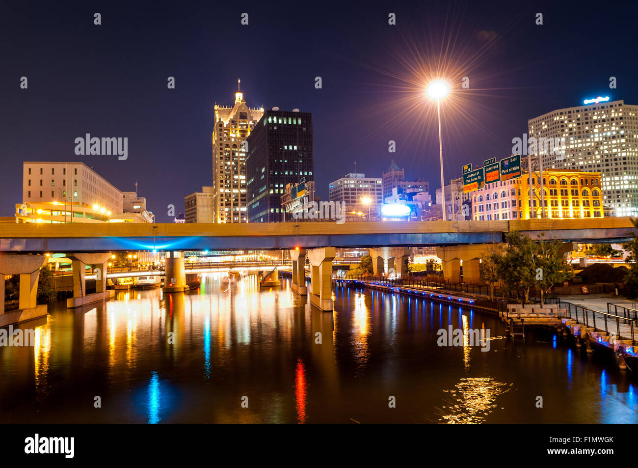 Milwaukee River, downtown buildings and busy interstate highway at ...