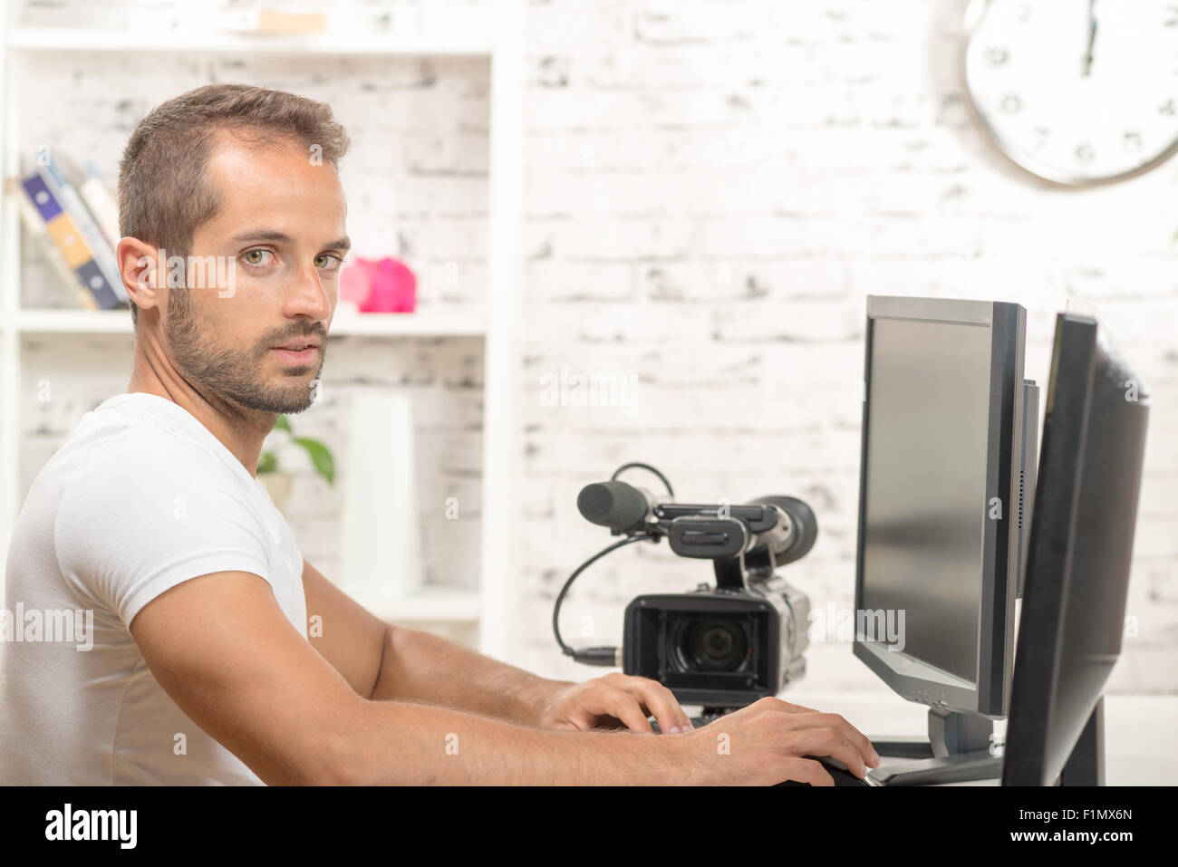 a young man video editor Stock Photo - Alamy