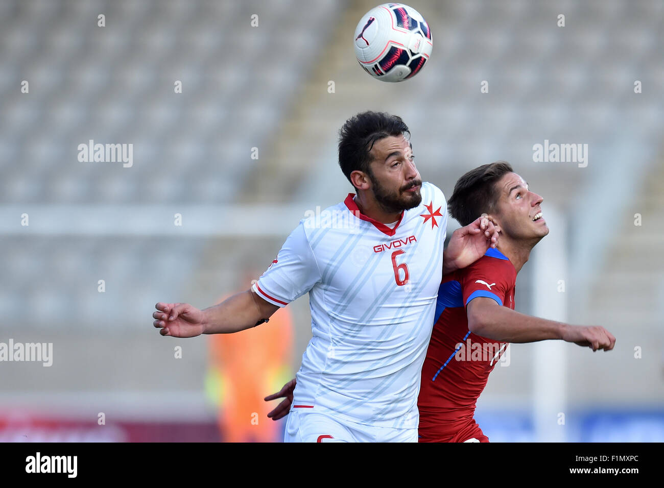 From left Czech Ales Cermak and Daniel Zerafa of Malta fight for a ball ...