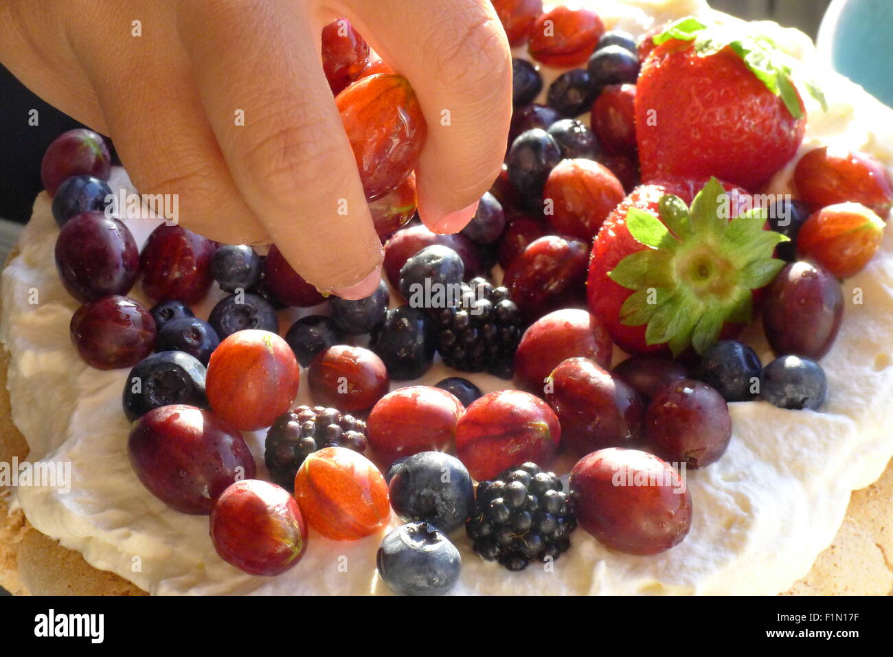 homemade Pavlova with fresh red fruits Stock Photo - Alamy