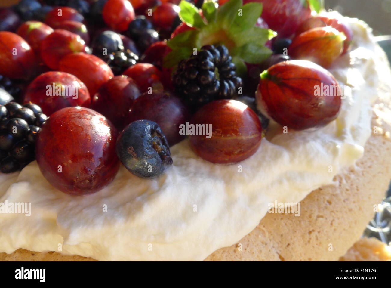 homemade Pavlova with fresh red fruits Stock Photo - Alamy
