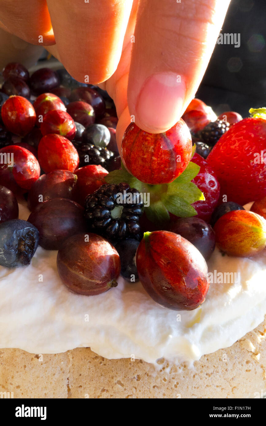 homemade Pavlova with fresh red fruits Stock Photo - Alamy