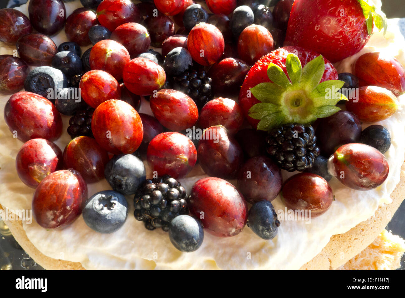 homemade Pavlova with fresh red fruits Stock Photo - Alamy