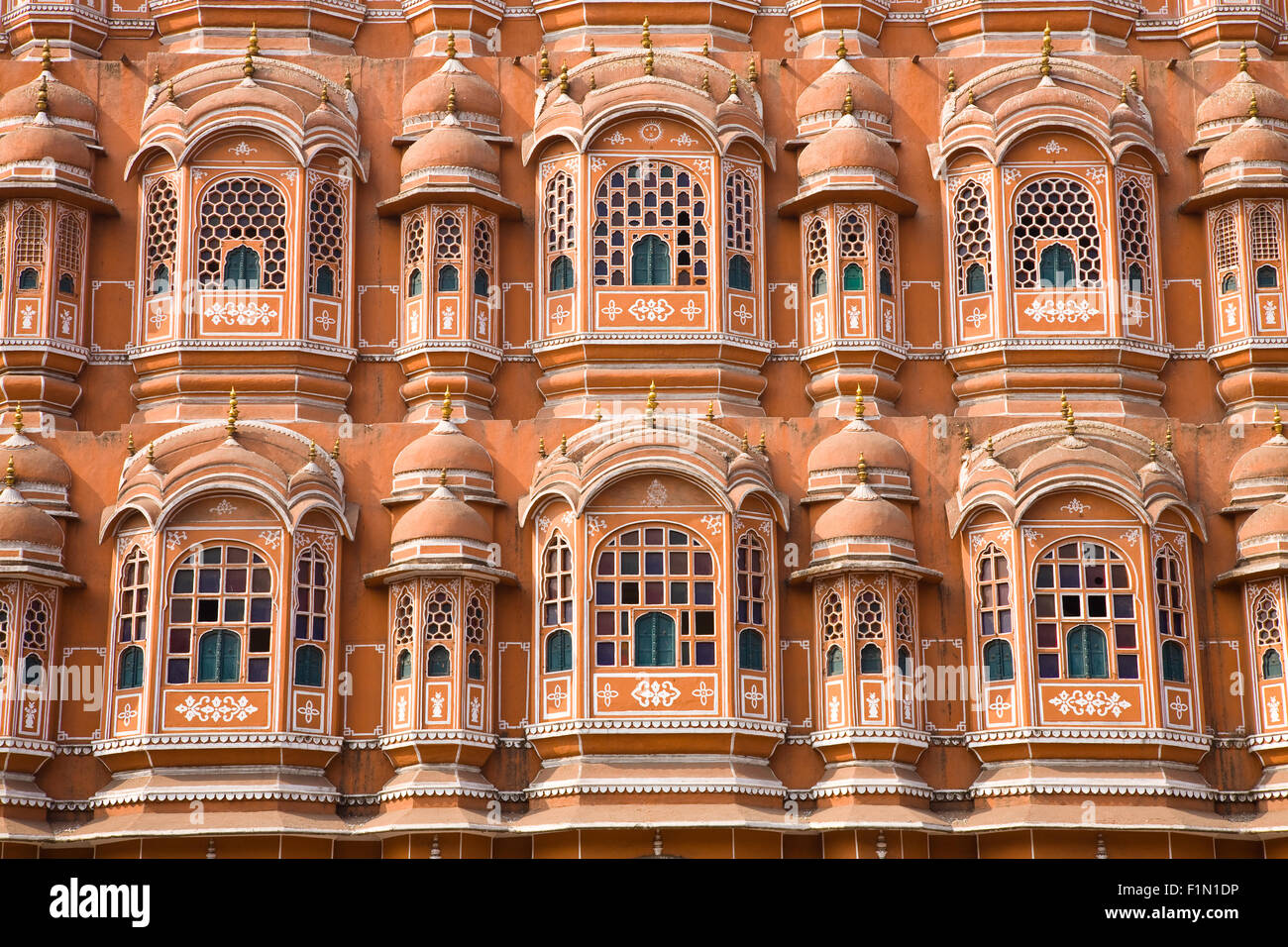 A detail of the facade of the pink Hawa Mahal as seen from the road in ...