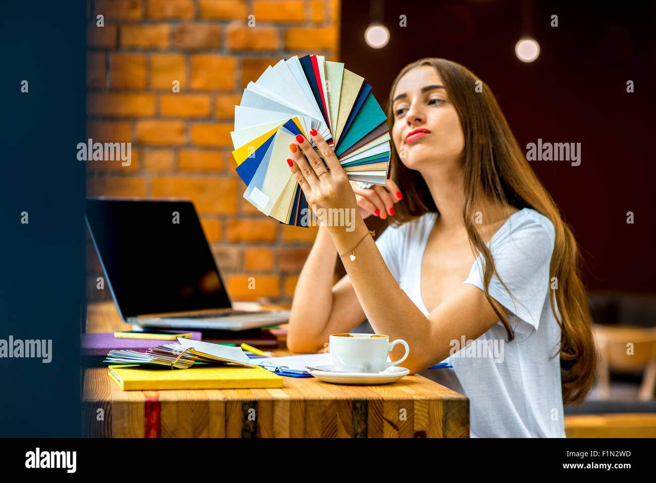 Young creative female designer hi-res stock photography and images - Alamy