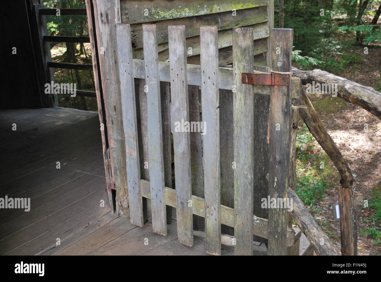 A wooden gate on a vintage wooden cabin with nature background Stock ...