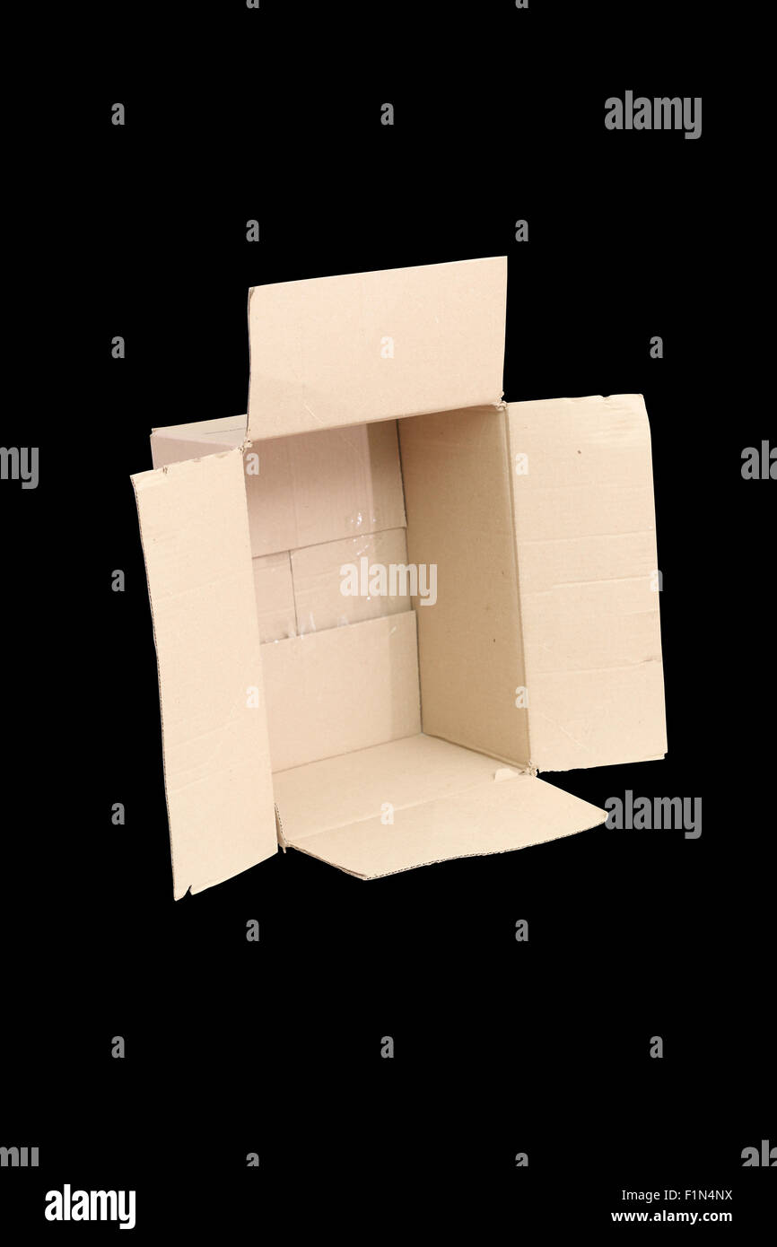 cardboard box on a black background Stock Photo - Alamy
