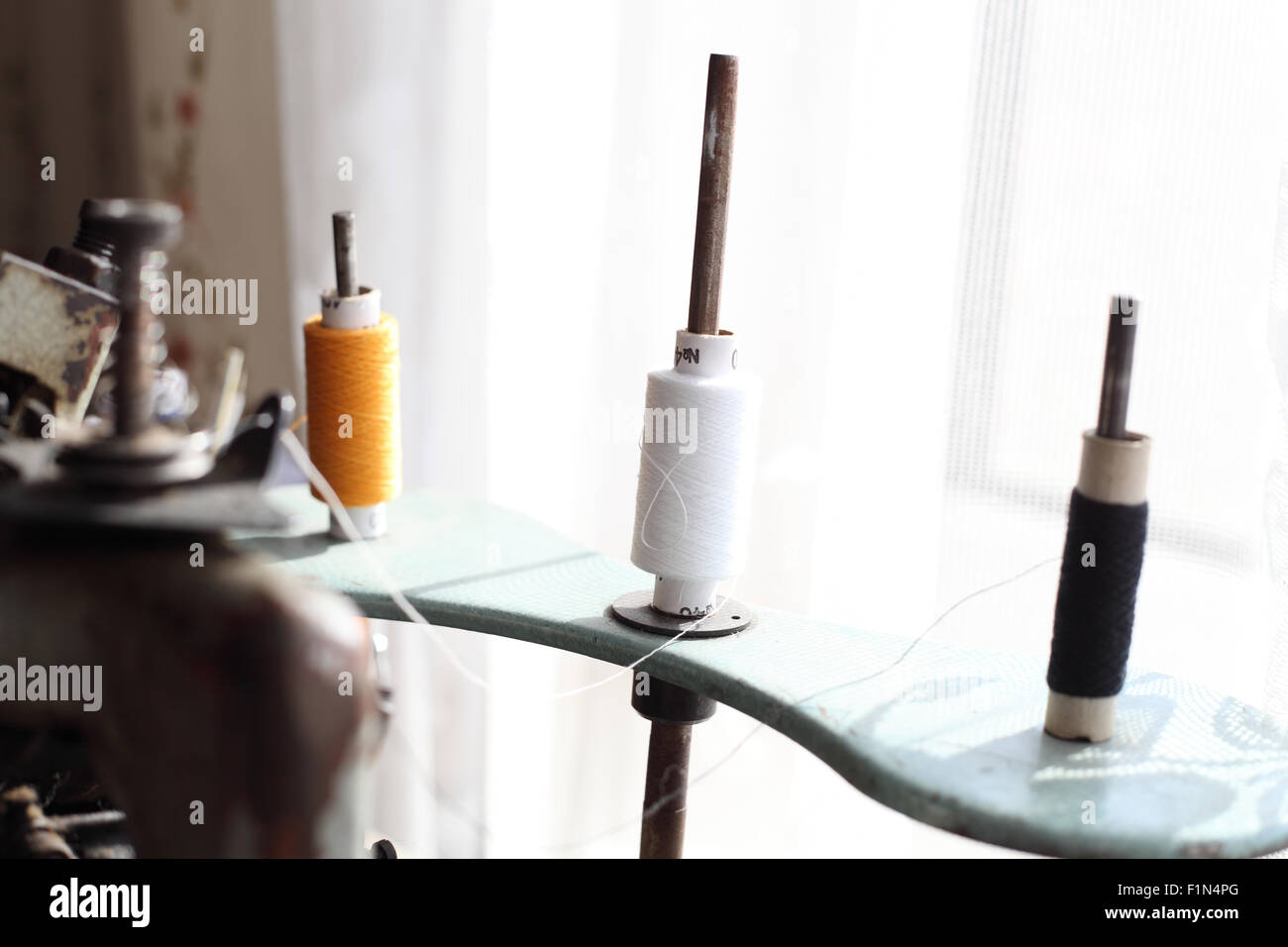 thread on sewing machine Stock Photo - Alamy