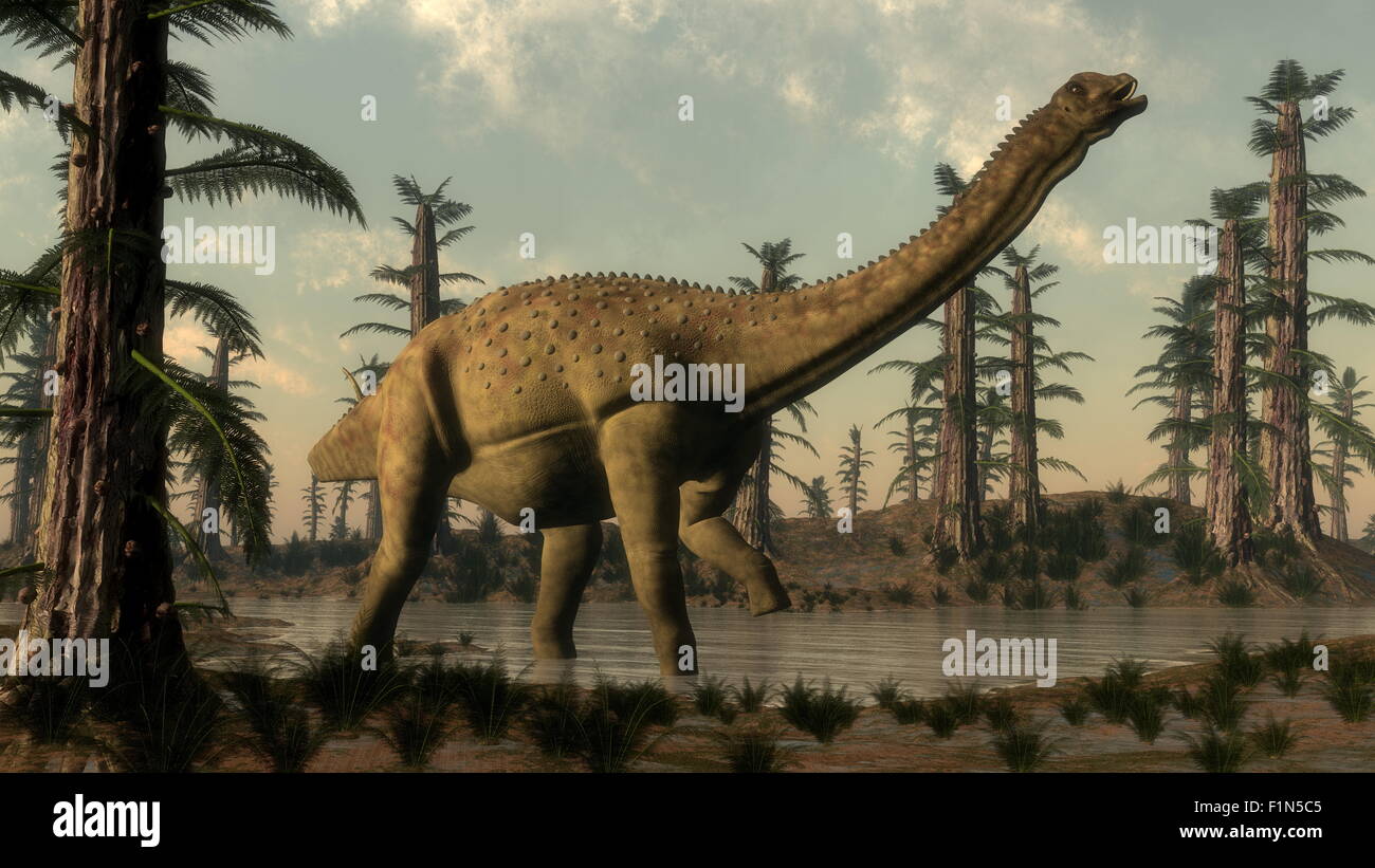 Uberabatitan dinosaur walking in the lake among tempskya trees and ...