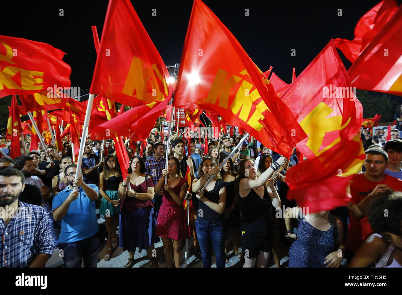 Athens, Greece. 4th September 2015. Young KNE supporters wave KKE flags ...