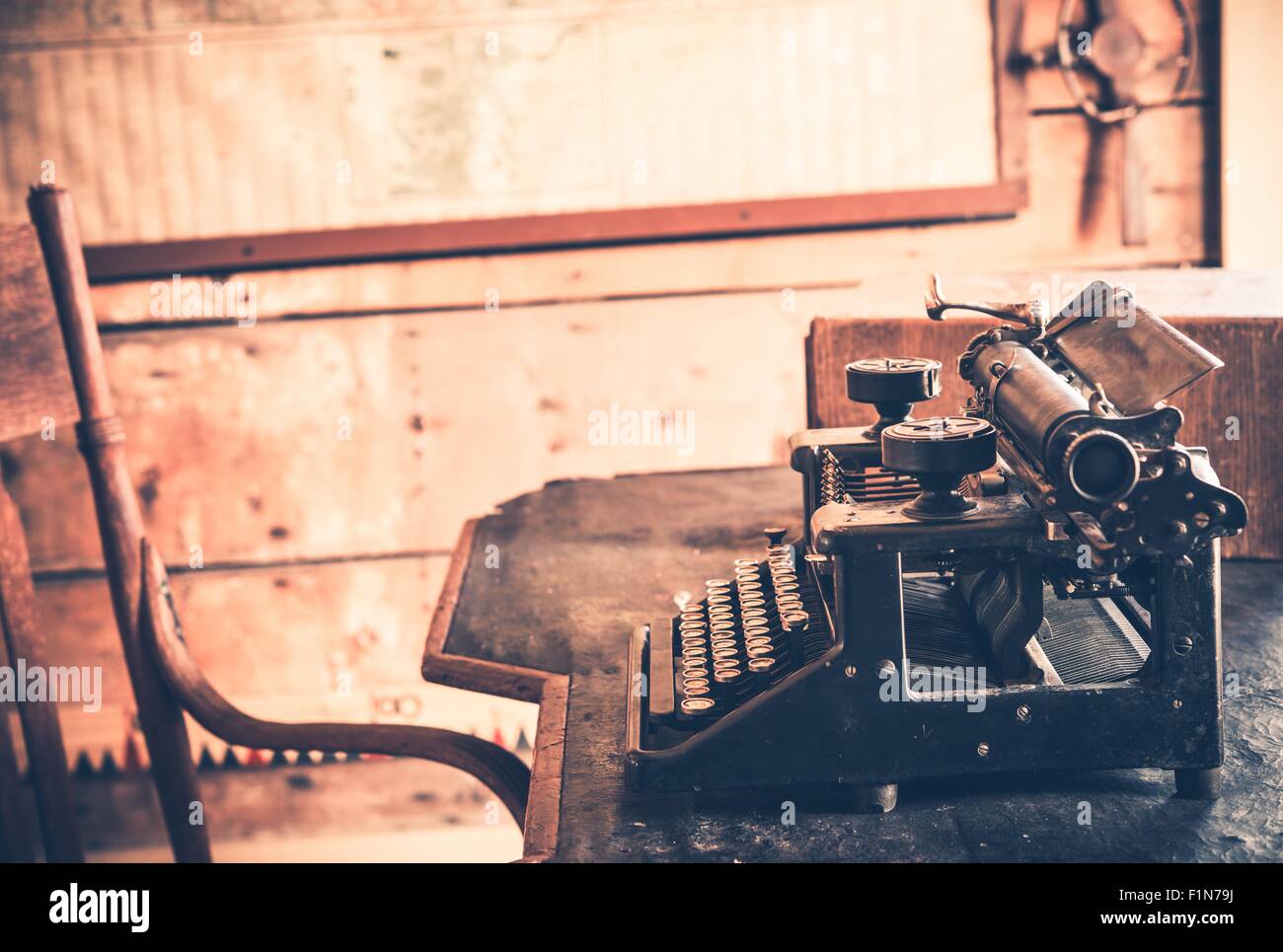 Vintage Room and Aged Wooden Desk with Typewriter Stock Photo - Alamy