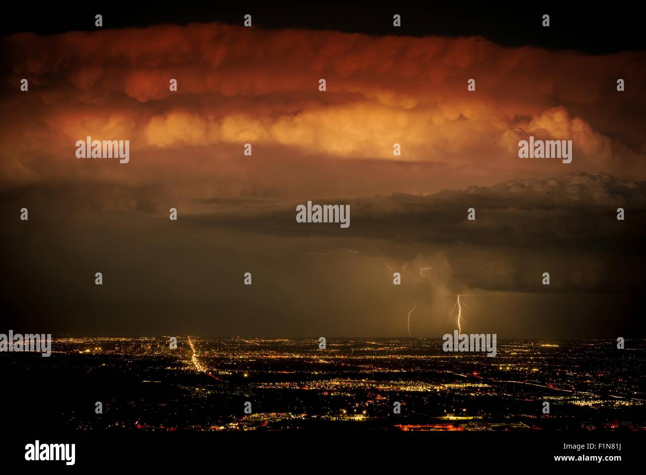 Thunderstorm lightning above night city hi-res stock photography and ...