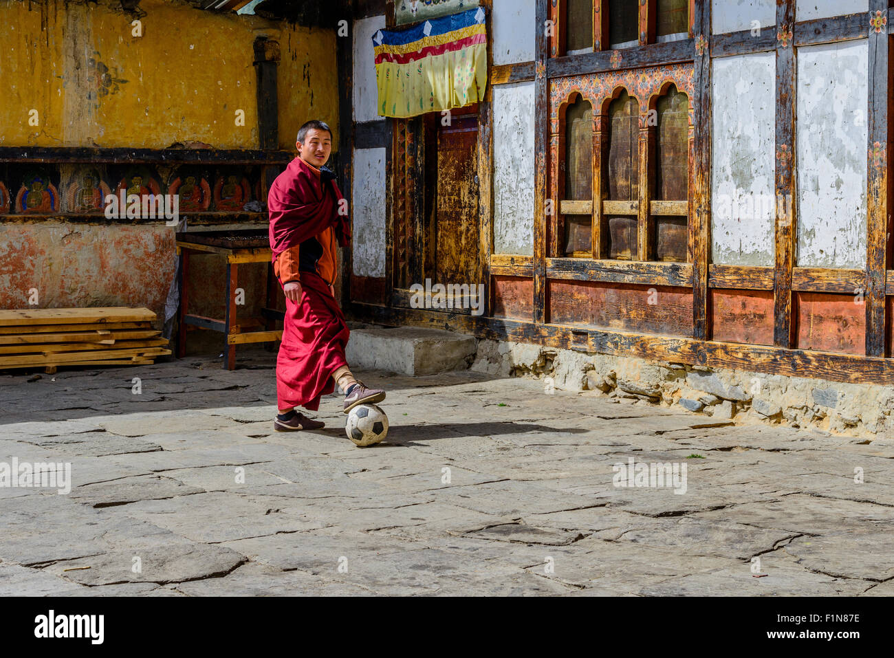 Monk at the monastery in Bhutan Stock Photo - Alamy